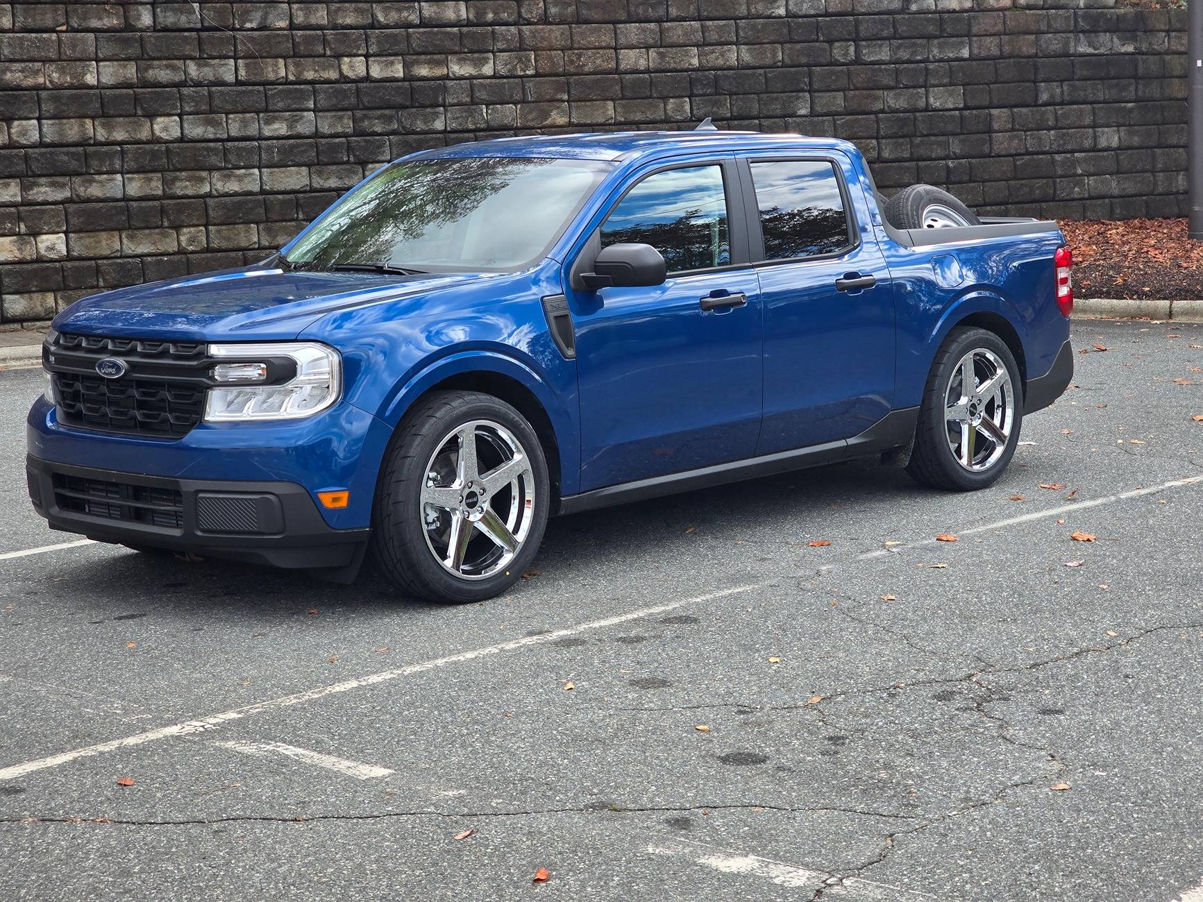New member. 2024 Maverick Atlas Blue. Lowered on 20's ...