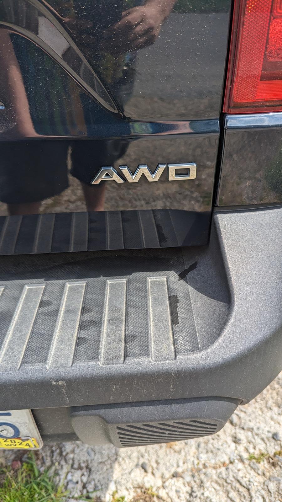 Blacked out AWD emblem | MaverickTruckClub - 2022+ Ford Maverick Pickup ...