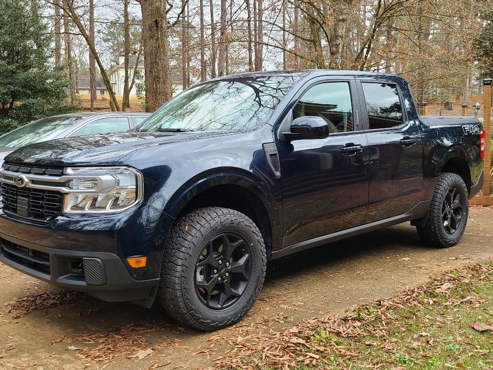 Lariat 2.0 AWD loaded with 2” FRL lift, Wildpeak AT3W, custom decals ...