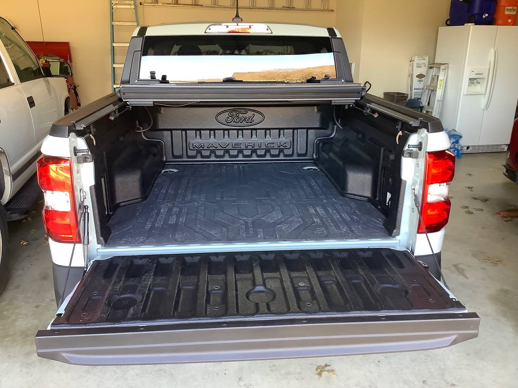 Replaced "factory" drop in bed liner tray and Tailgate with bedrug ...