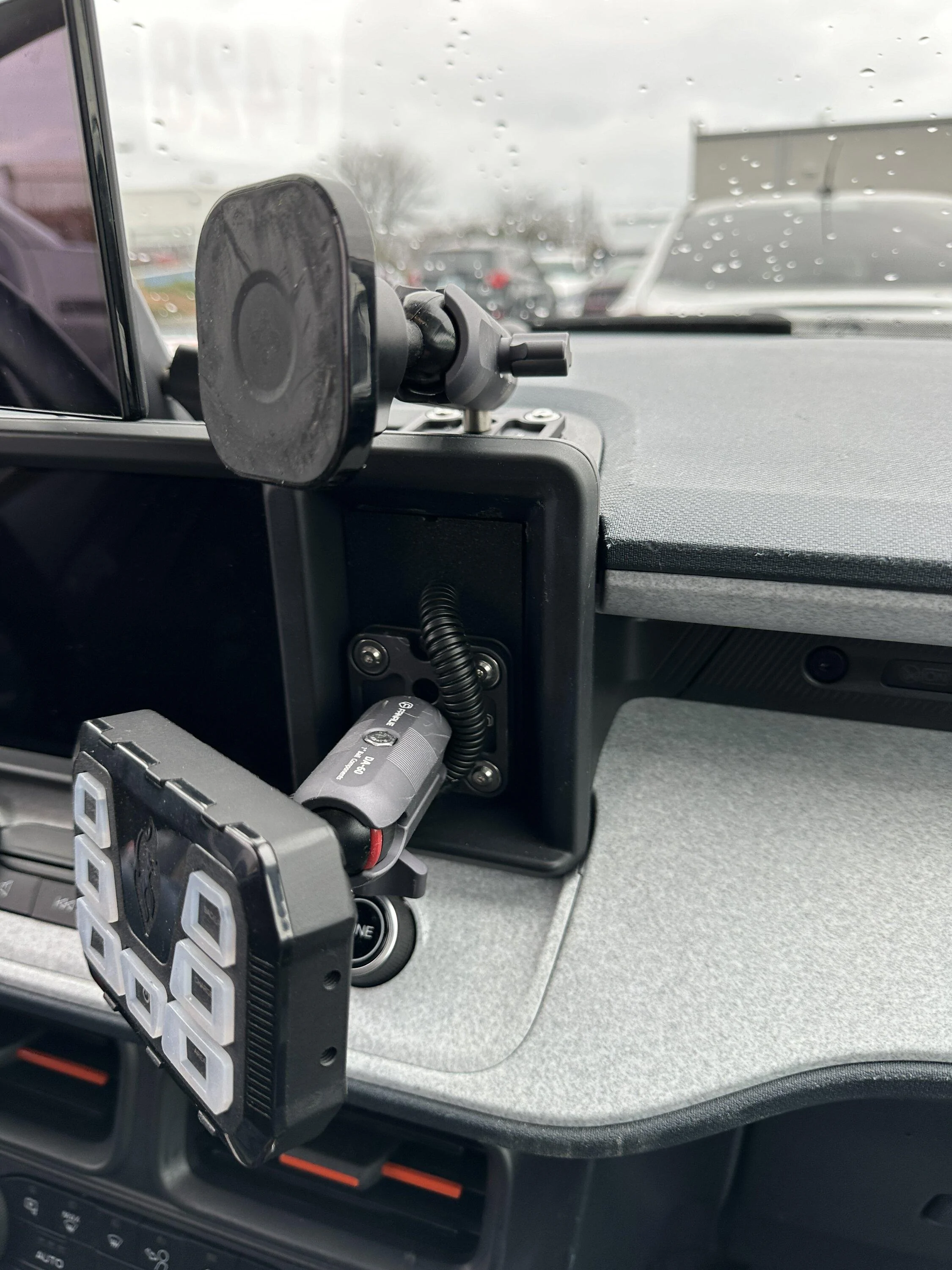 Anyone have a solid cubby solution for holding phone with case ...