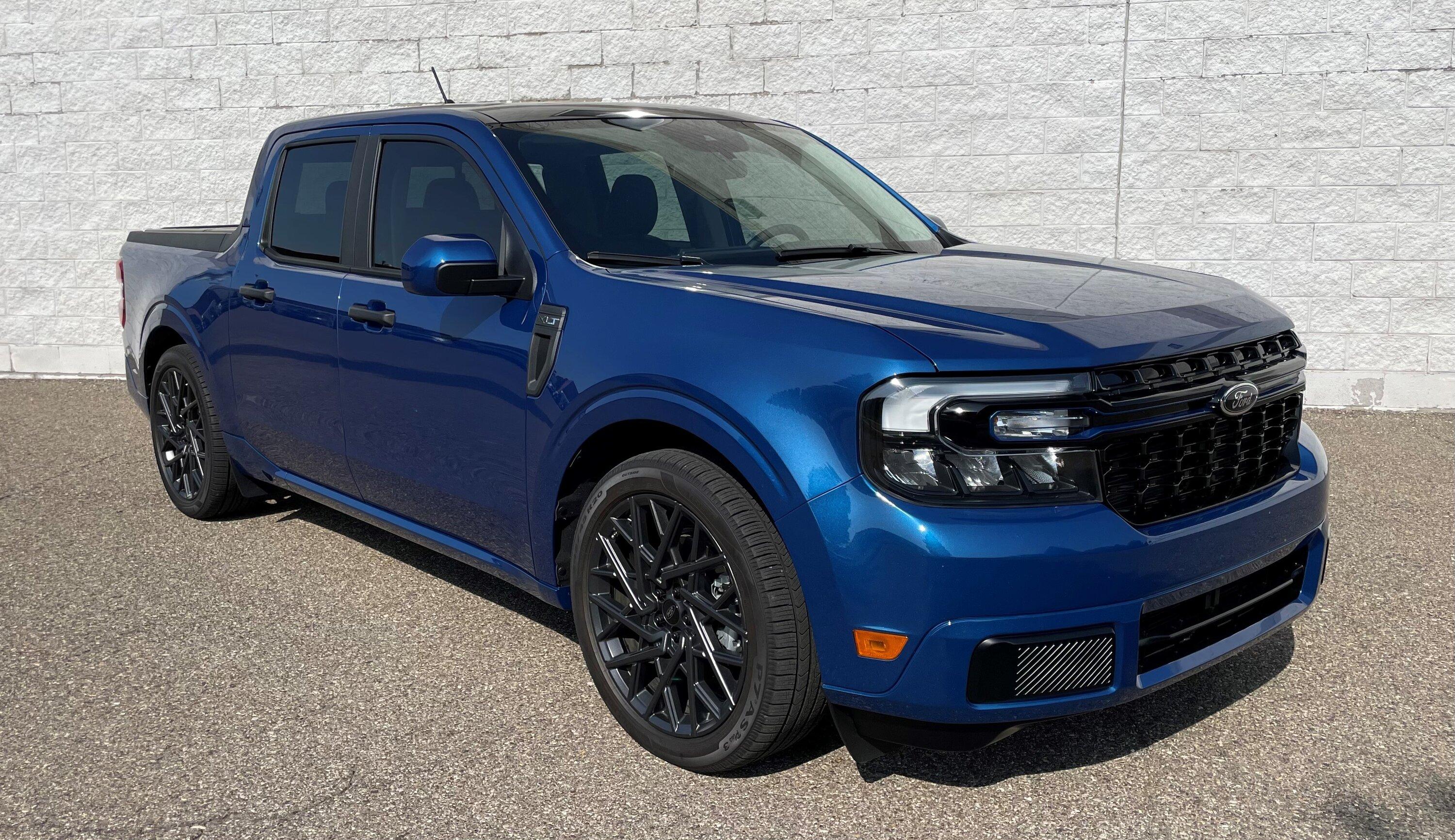 Body colored, lowered Atlas Blue Maverick on 20's Mach-E Wheels ...