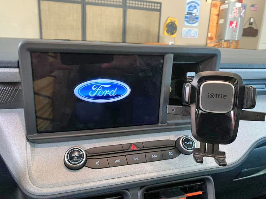 Smartphone holder suction mount transforms Maverick dash cubby into ...