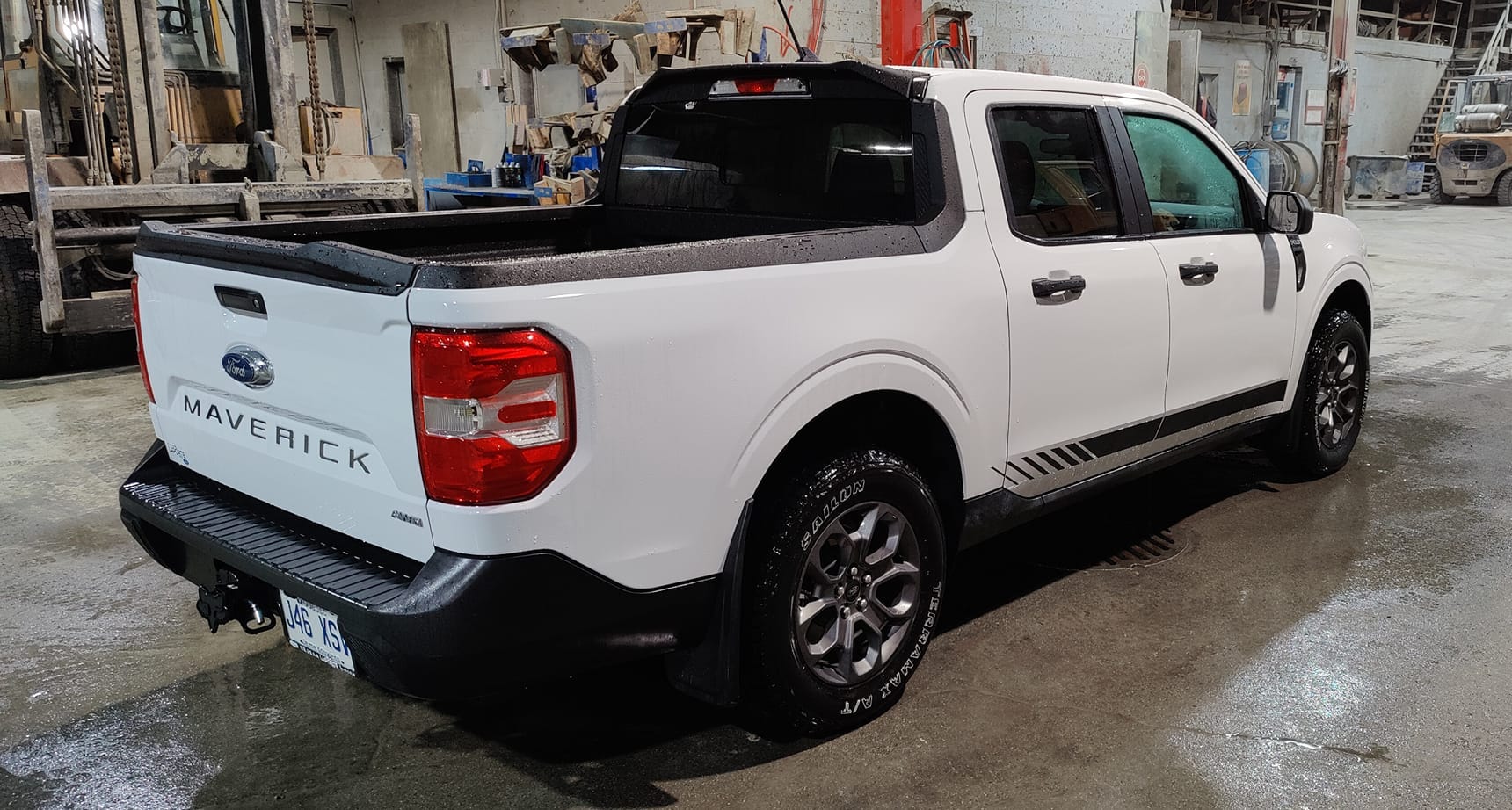 White Maverick looking good with cab spoiler, mudflaps, tailgate ...