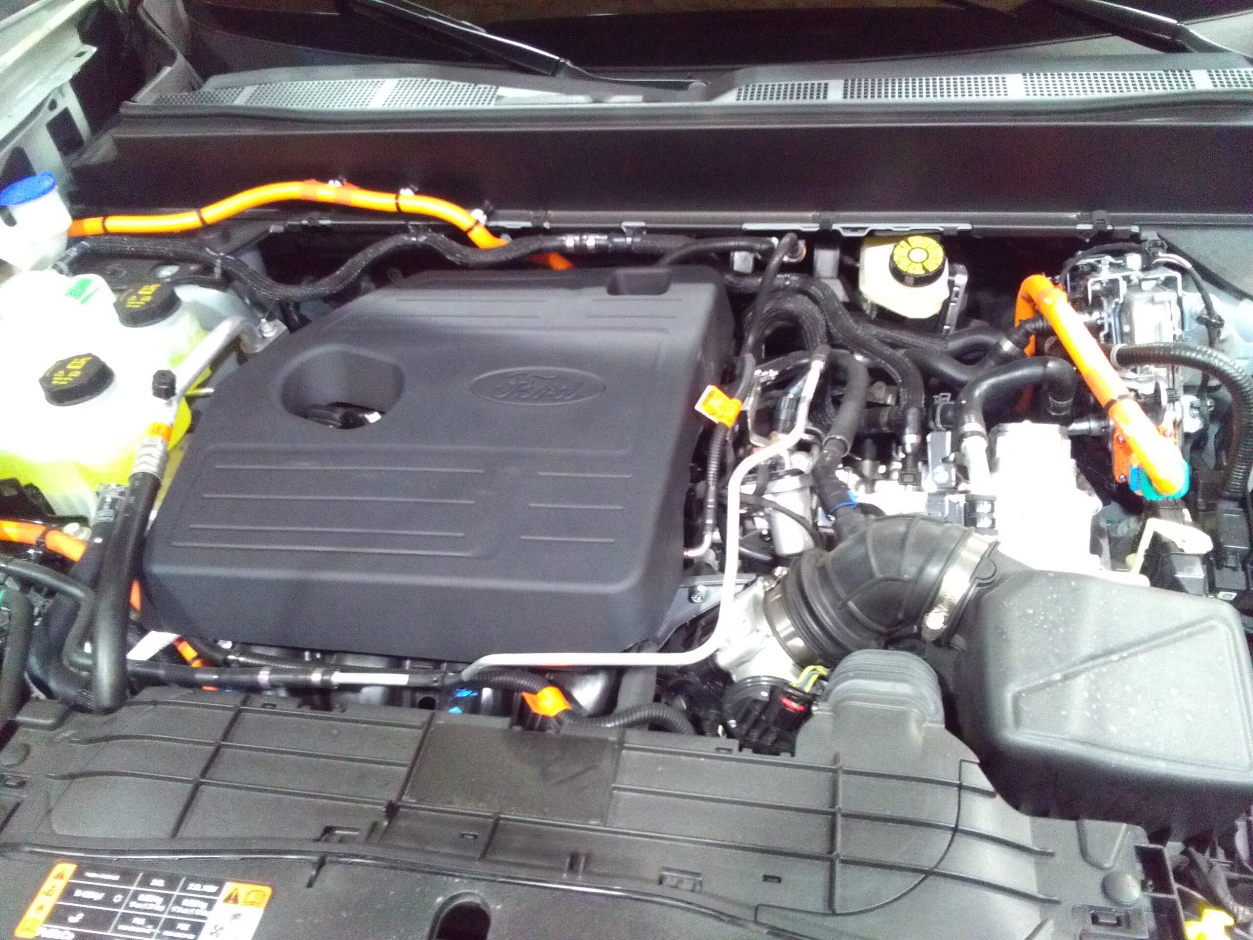 Engine cover installed on Maverick Hybrid Lariat. Part numbers inside ...