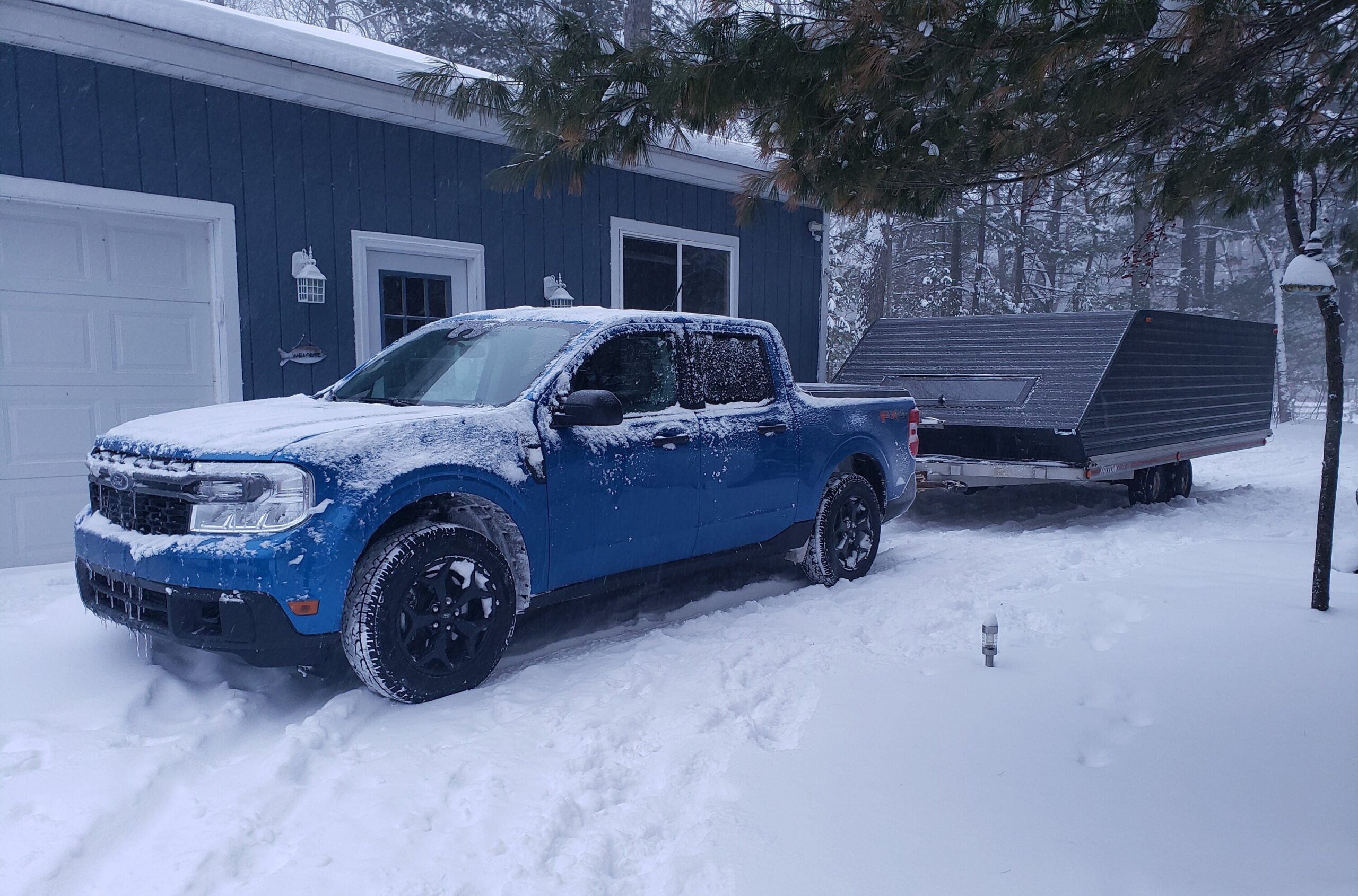 Maverick does snowmobile rescue (towed snowmobile trailer ...