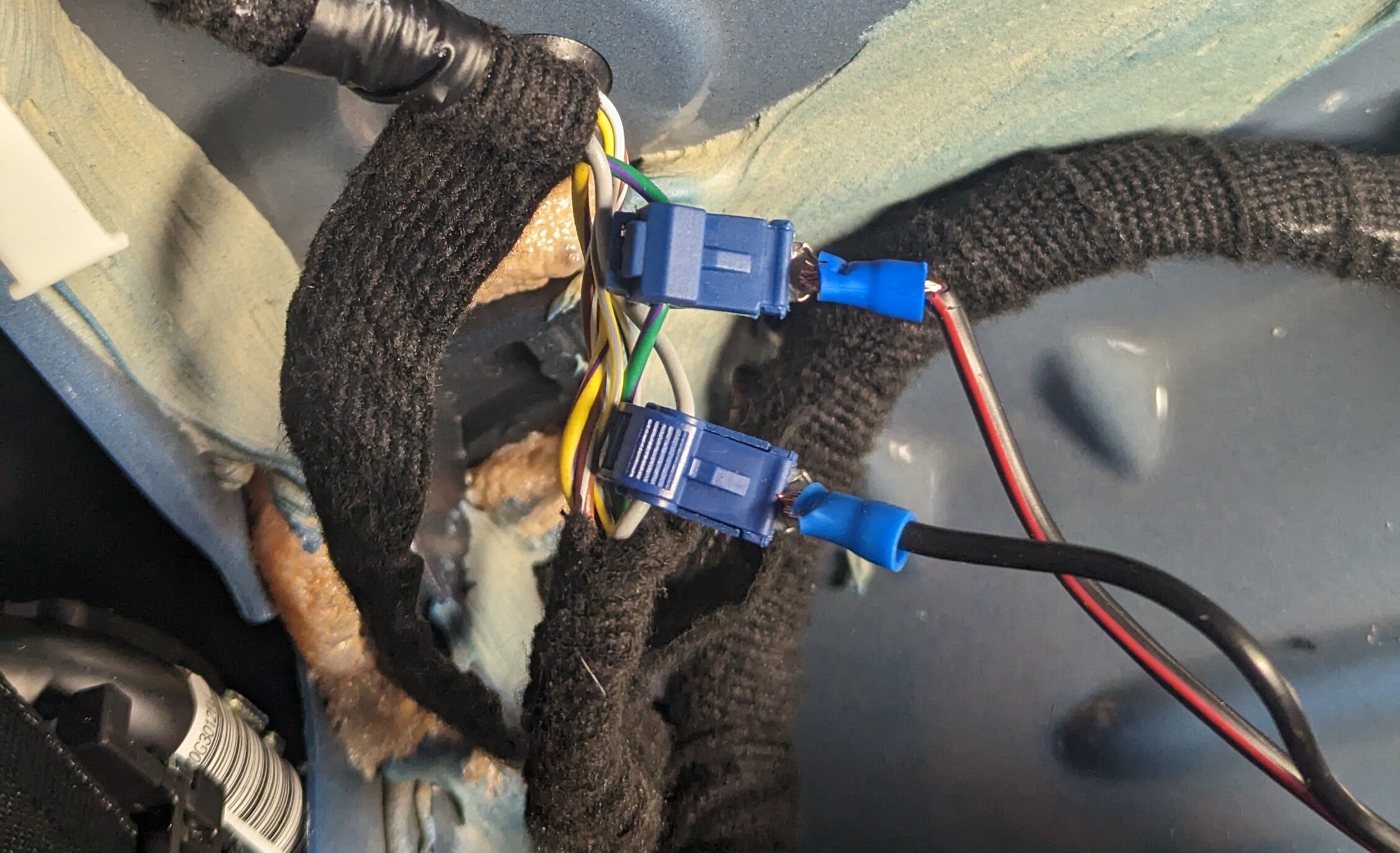 Rear speaker wires for sub install -- use this location to tap into the ...