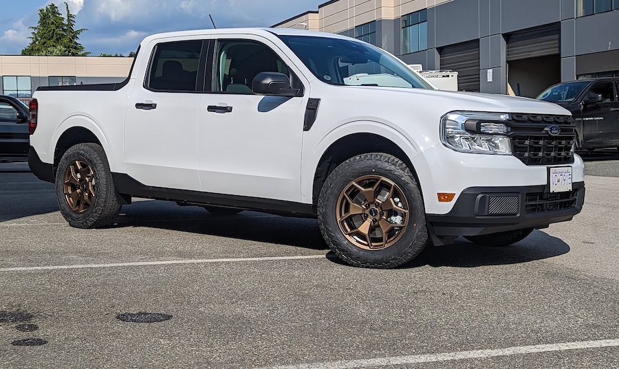 Bronze painted RTX ranch wheels on Oxford White Maverick ...