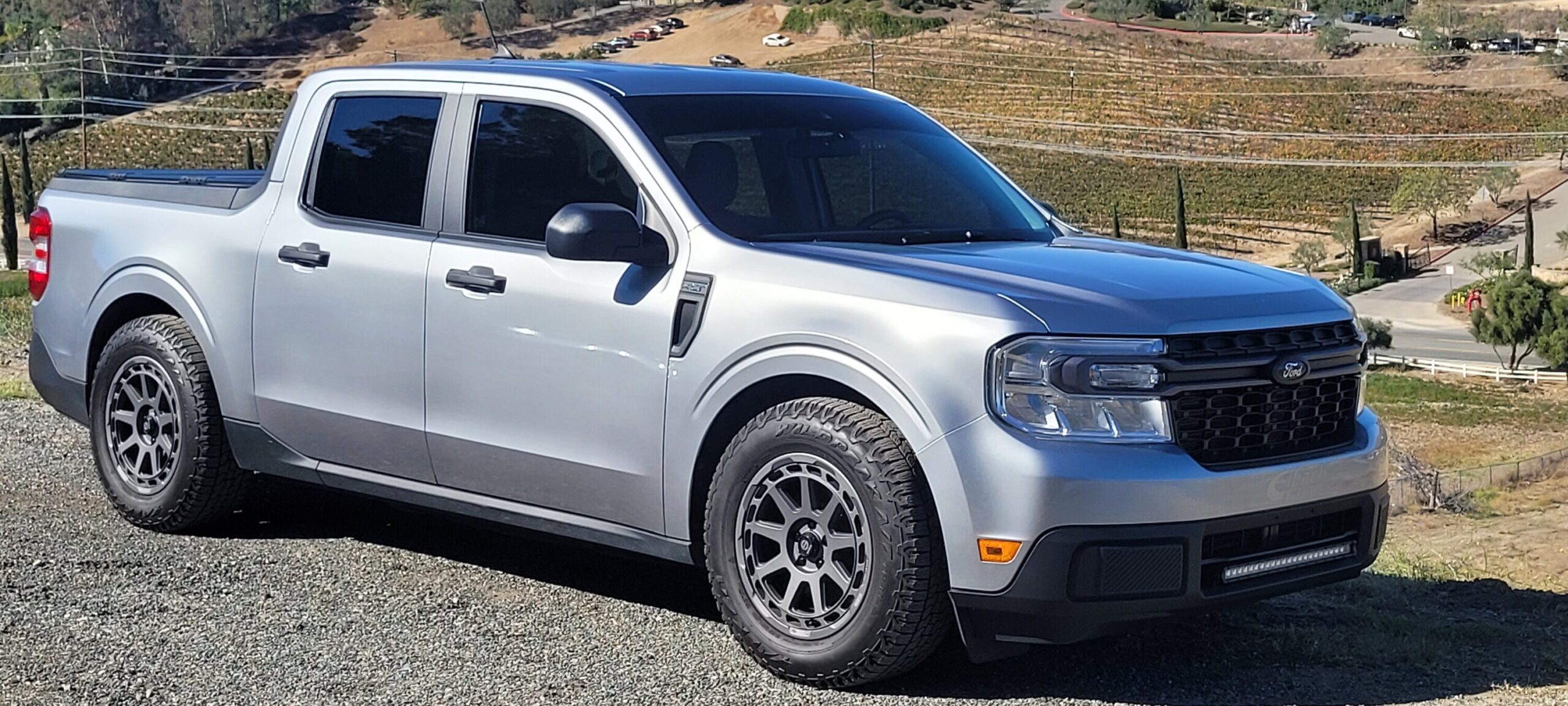 Lowered Silver Maverick Hybrid w/ big boots (245-65-17 Falken Wildpeak ...